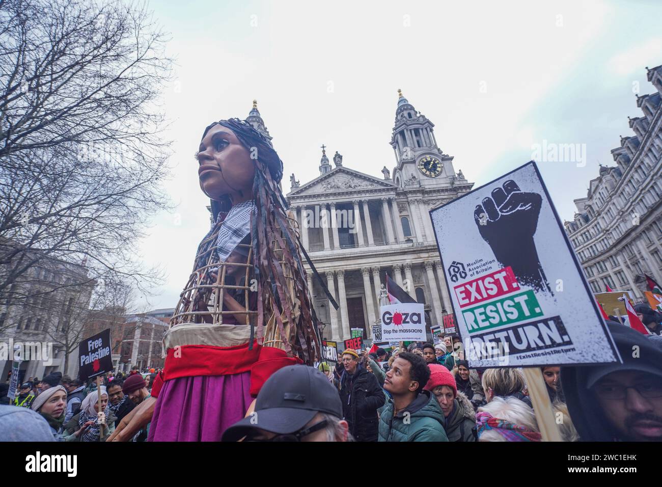 London, UK. 13 January 2024. . Little Amal the Syrian refugee puppet ...