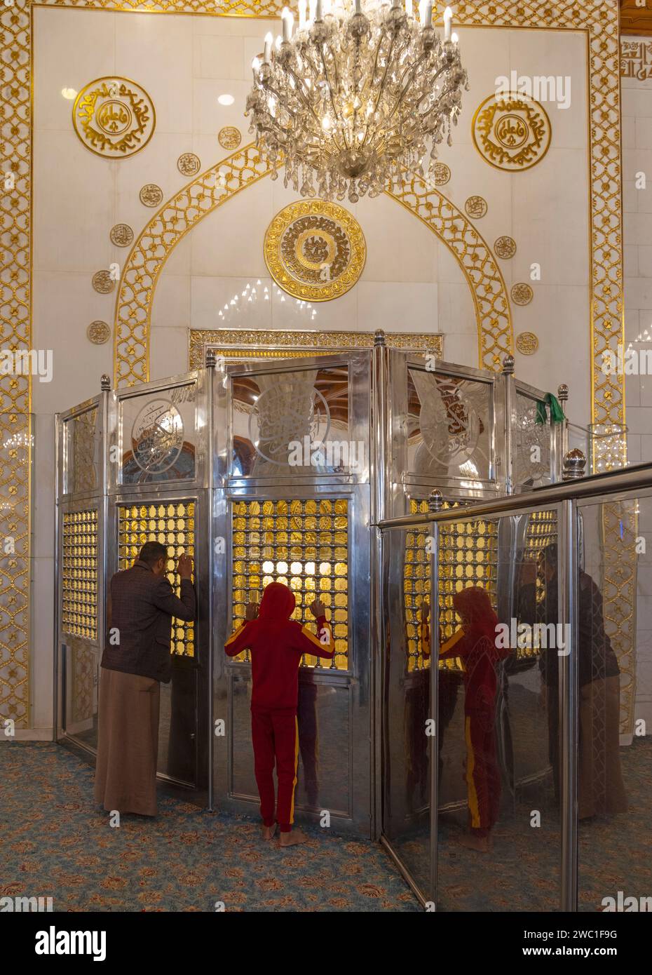 pilgrims at the mihrab where Imam Ali was murdered, Great Mosque of ...