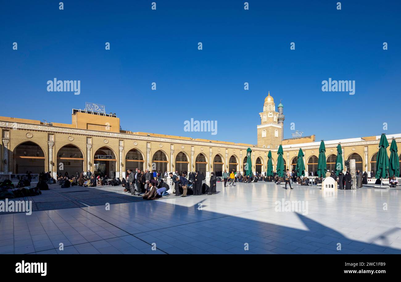pilgrims in the courtyard of the Great Mosque of Kufa, Iraq Stock Photo ...