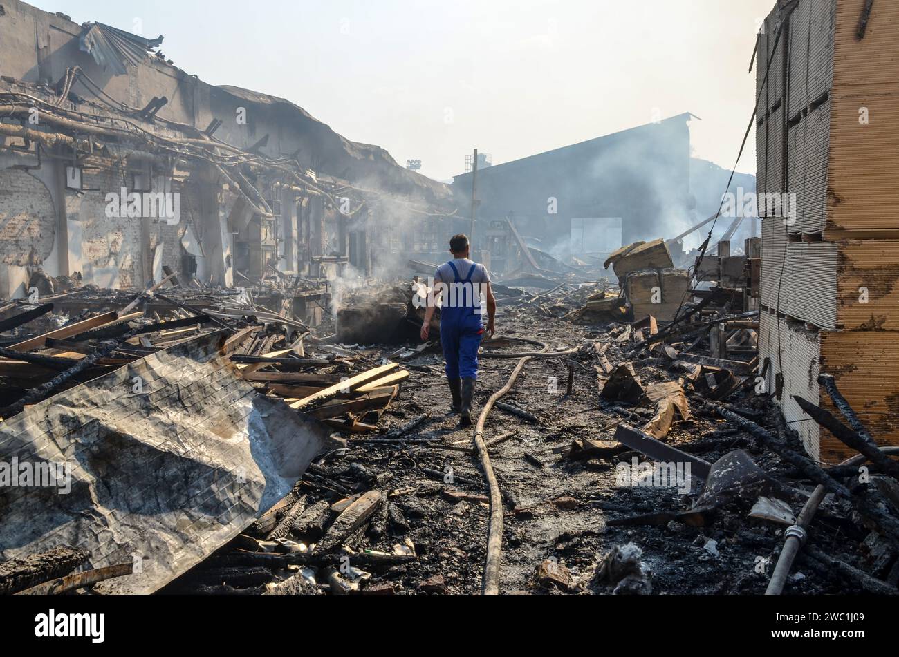 Man insideburned industrial complex damaged and destroyed factory remnants of hi-res stock ...