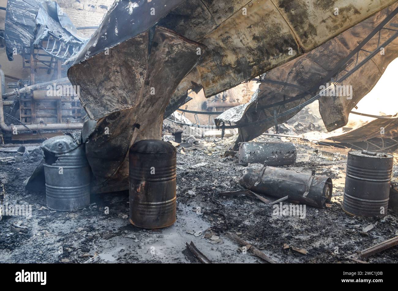 Exploded burned and damaged industrial complex burned factory remnants ...