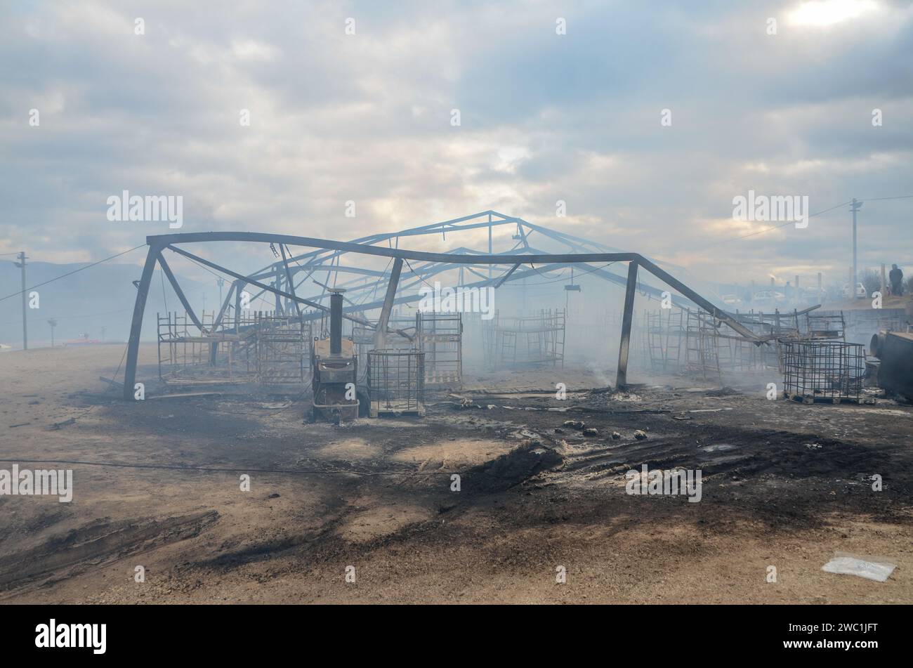 Smoke from a burning building. A large fire destroyed object. Burned ...