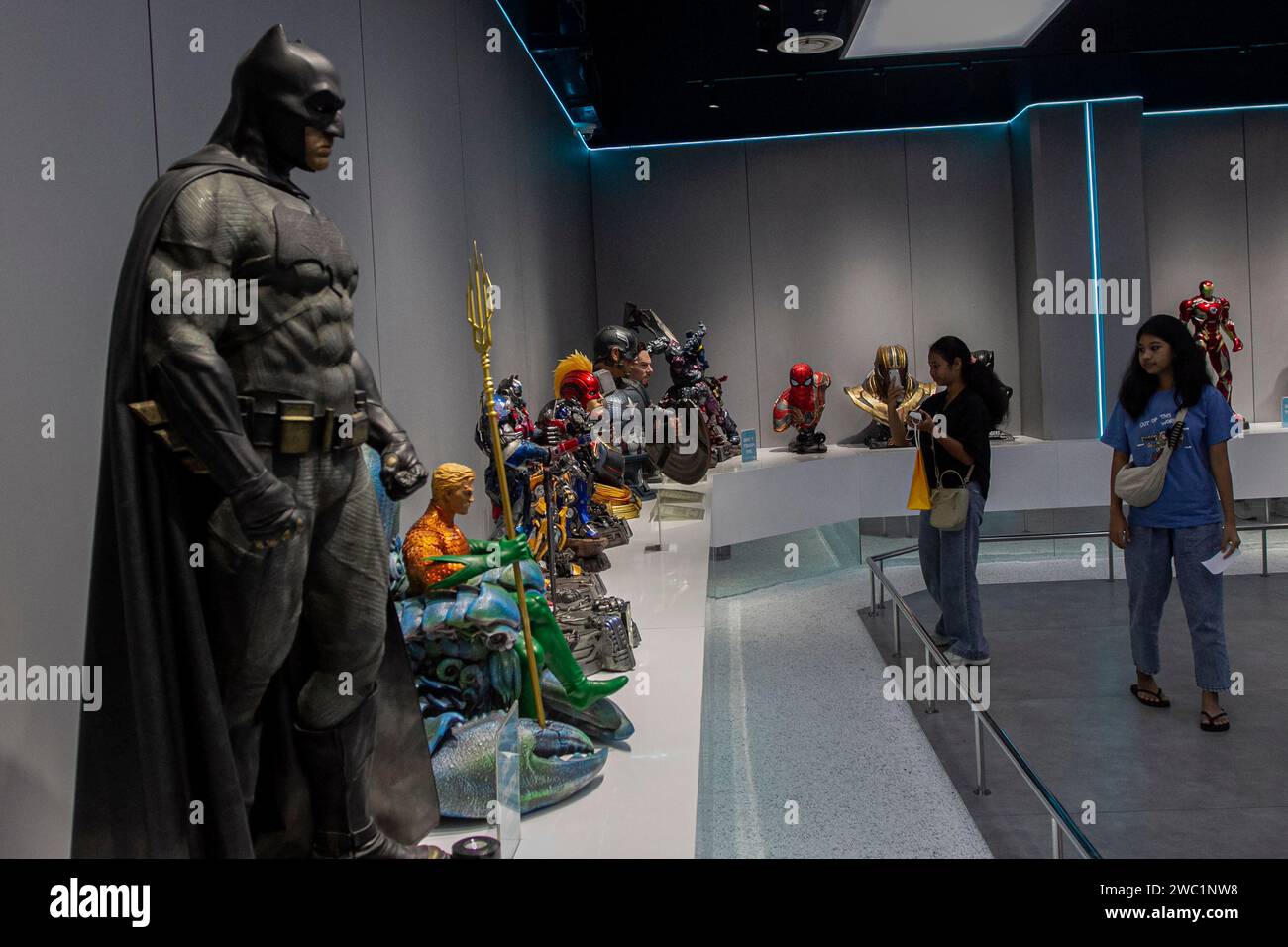 Sleman, Yogyakarta, Indonesia. 13th Jan, 2024. Two women look at a ...