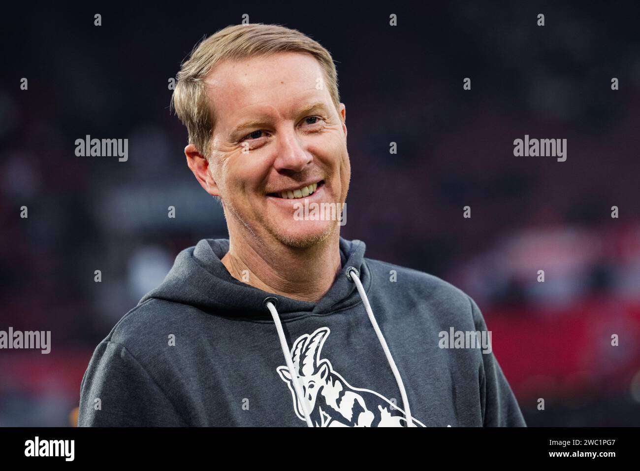 Cologne, Germany. 13th Jan, 2023. Cologne coach Timo Schultz smiles ...
