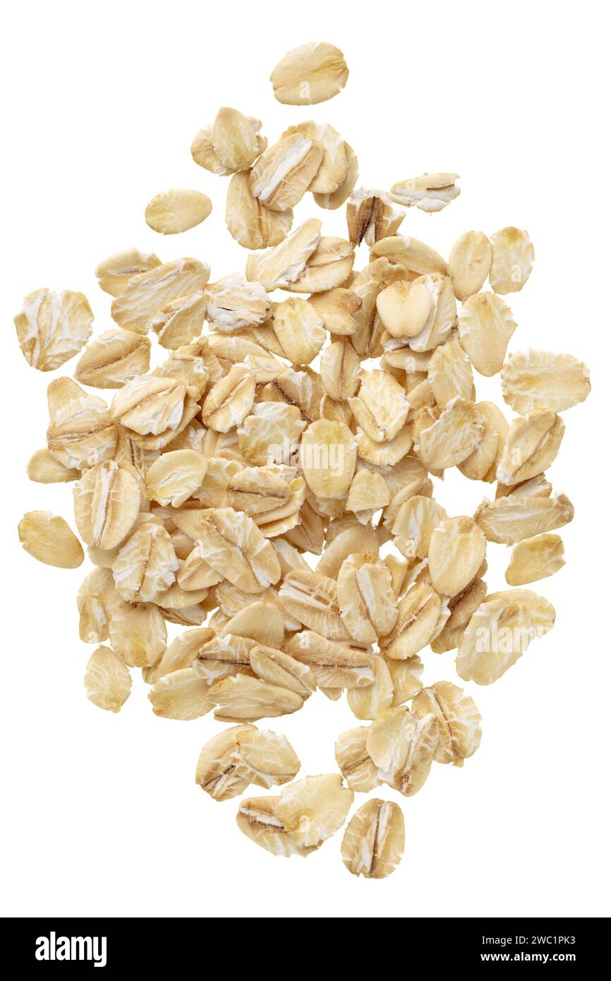 Pile of uncooked oat flakes cereals, close-up shot, isolated on white ...