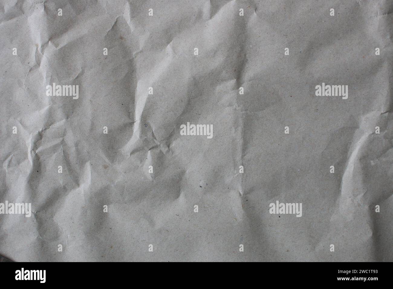 Background from used crumpled gray wrapping paper Stock Photo - Alamy
