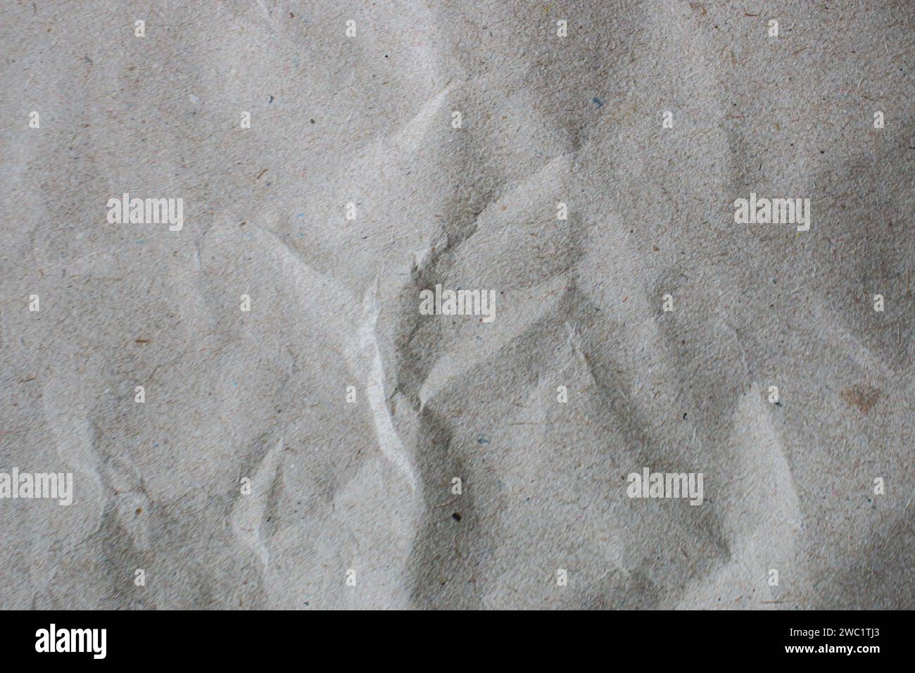 Background from used crumpled gray wrapping paper Stock Photo - Alamy