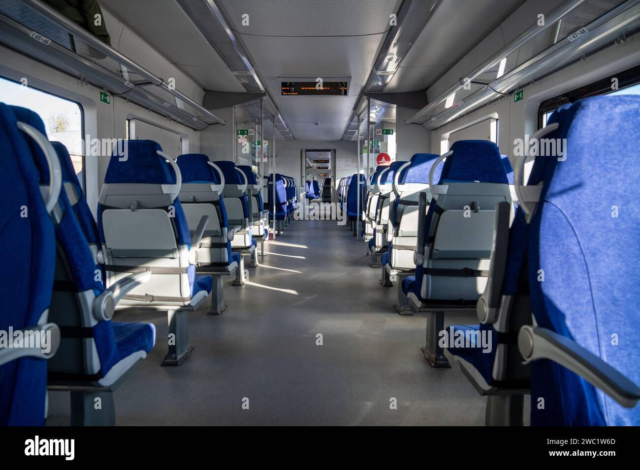 Interior of modern passenger high-speed express train. Inside the train ...