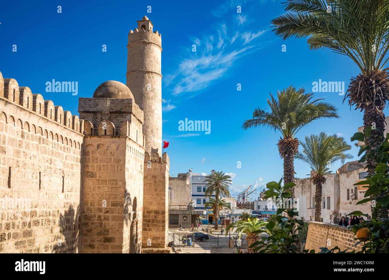 The imposing walls, ramparts and tower of the 8th century religious ...