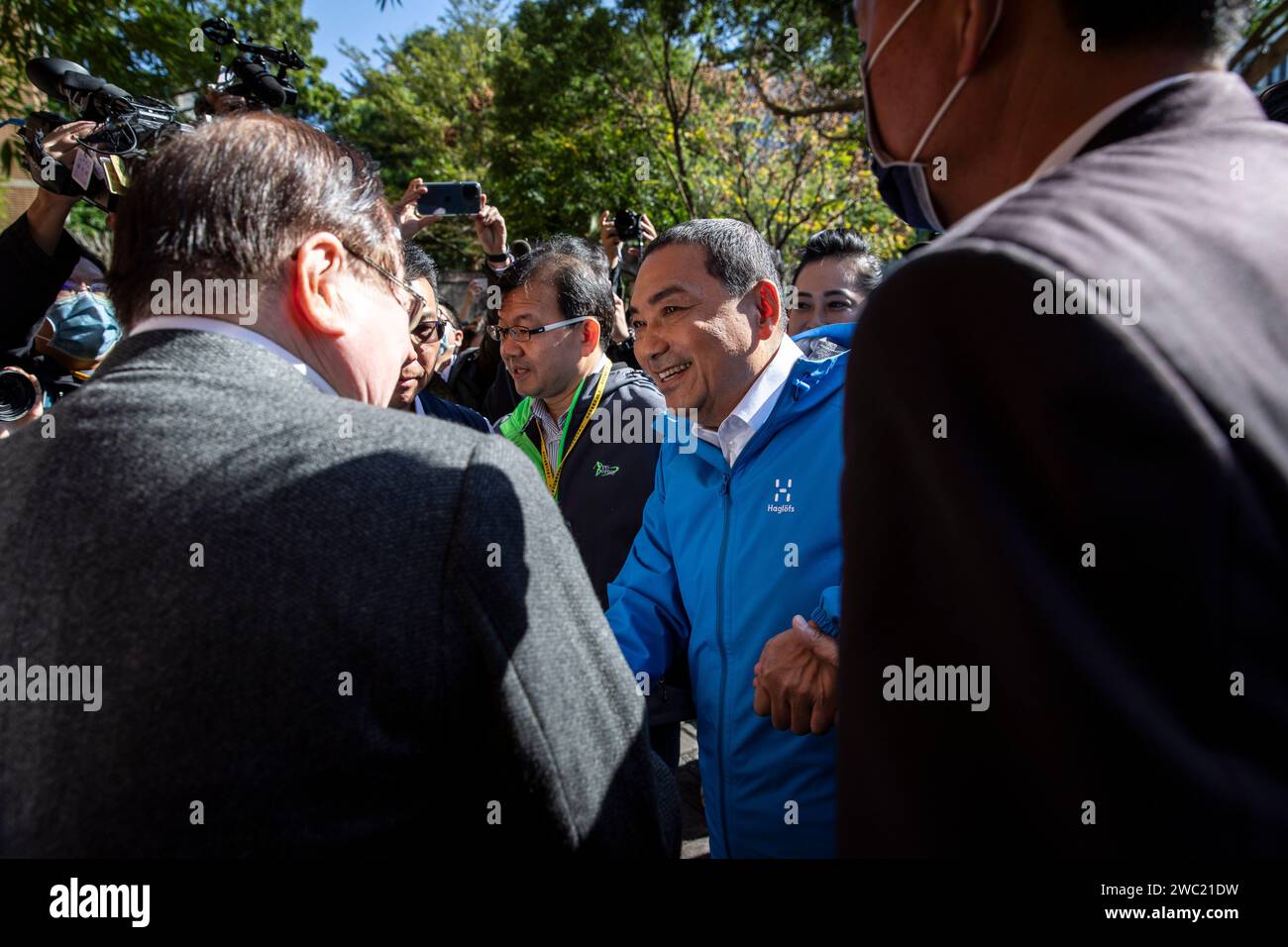 KMT President Candidate Hou Yu-ih shaked hands with others after ...