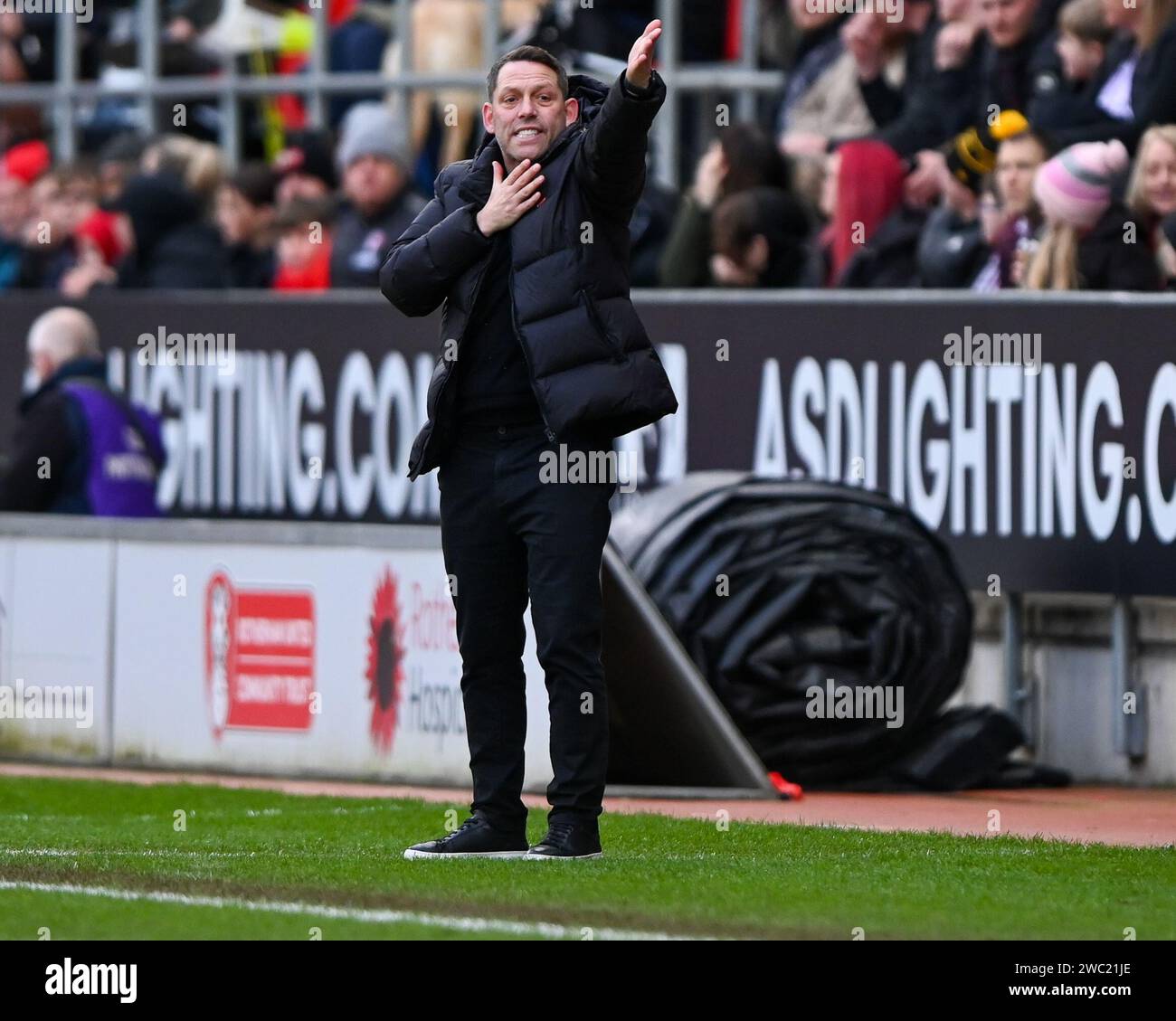 Leam Richardson manager of Rotherham United gives his team instructions ...