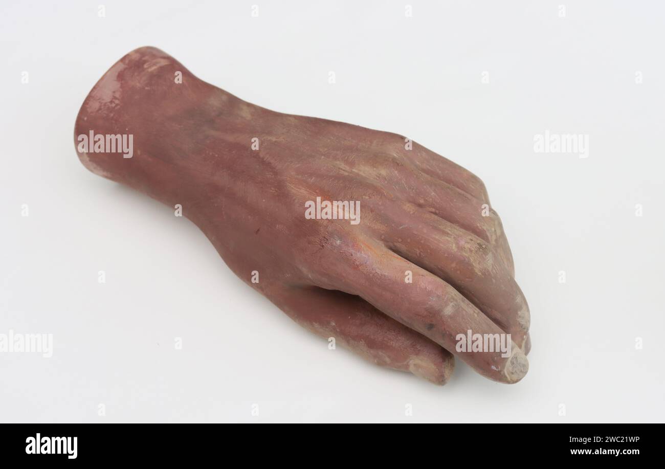 Old painted mannequin hand. Part for a human mannequin Stock Photo - Alamy