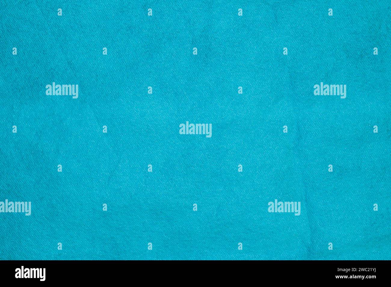 Blue nonwoven polypropylene material texture background Stock Photo - Alamy