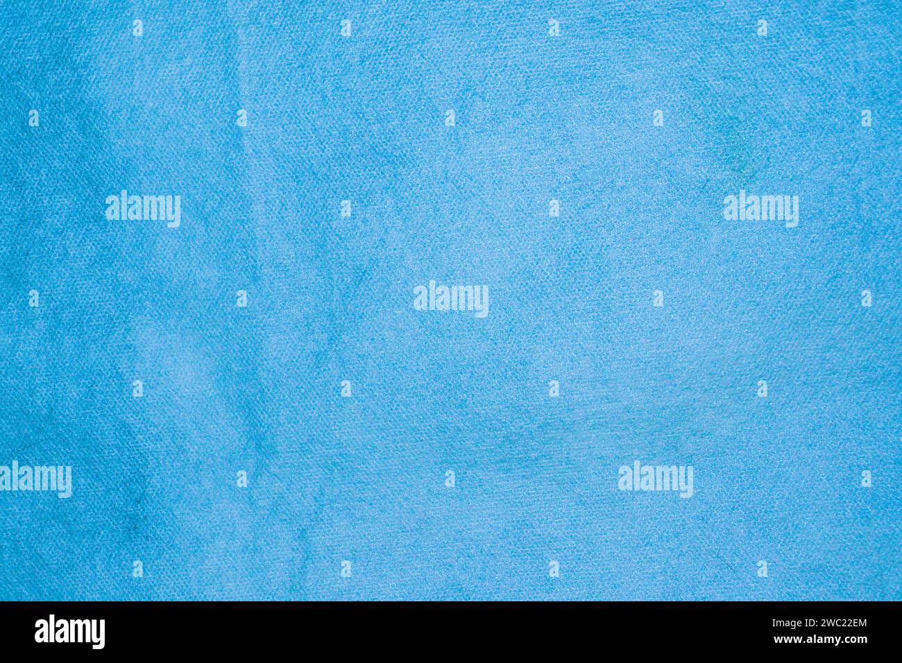 Spongebond texture in blue. Blue nonwoven polypropylene material ...