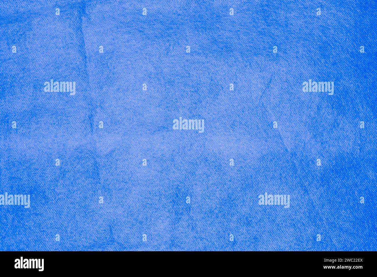 Spongebond texture in blue. Blue nonwoven polypropylene material ...