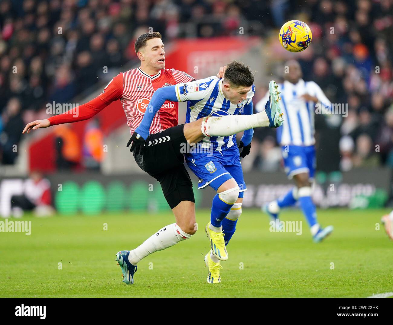 Southampton's Jan Bednarek (left) challenges Sheffield Wednesday's Josh ...