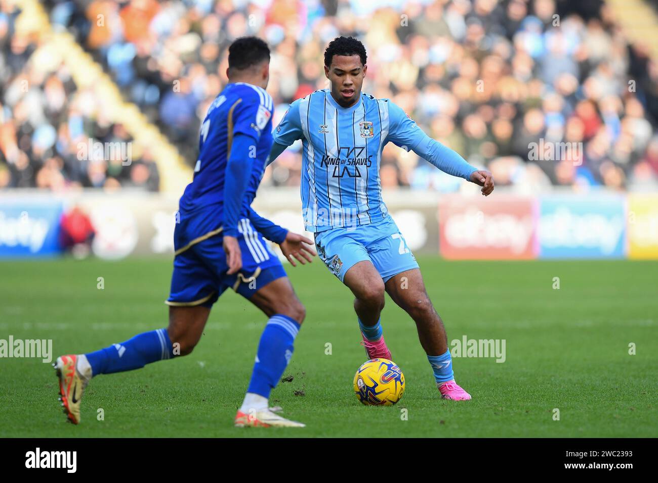 Milan van Ewijk of Coventry City under pressure from James Justin of ...