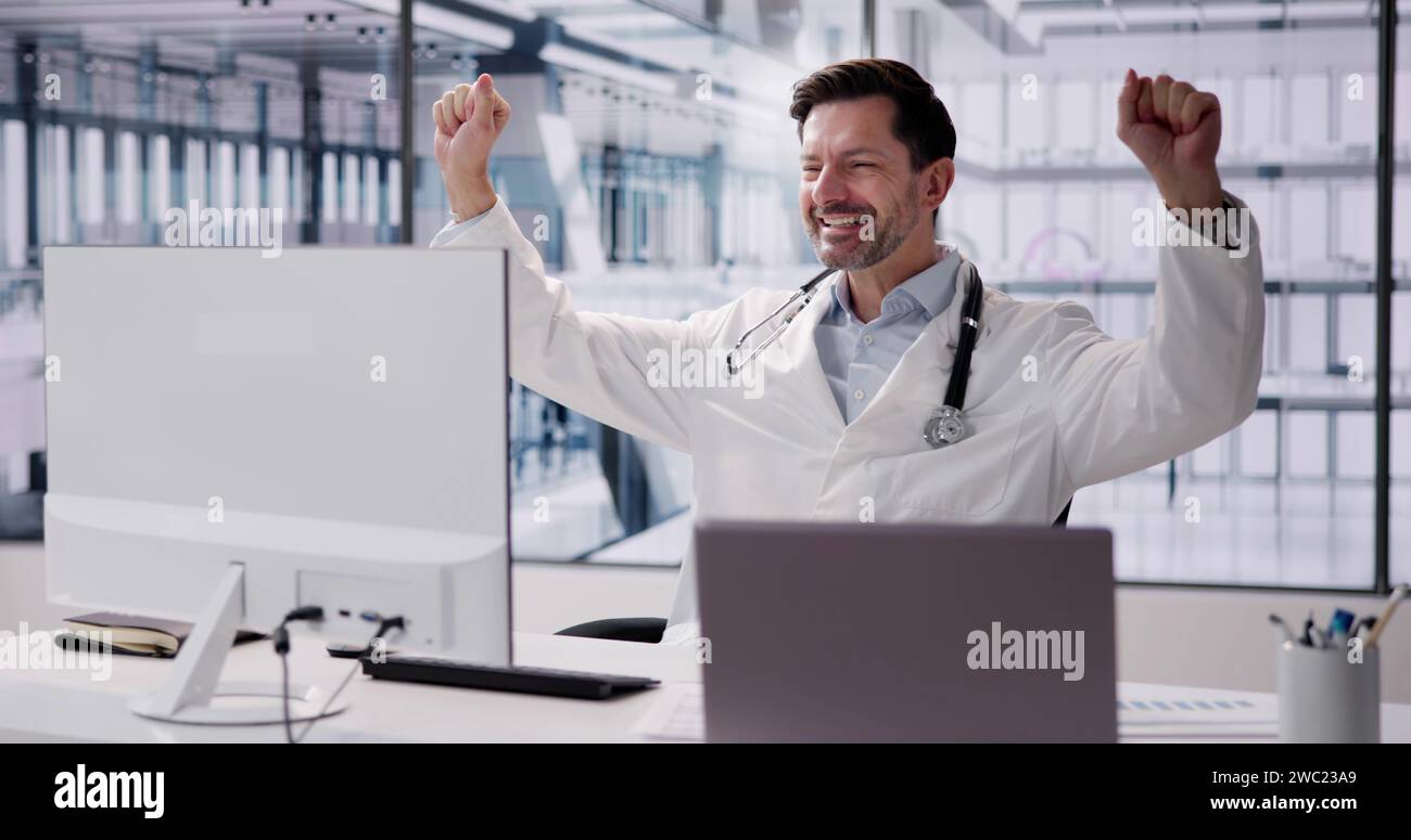 Professional man raising arms in hi-res stock photography and images ...