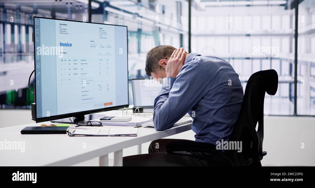 Sad Frustrated Accountant Man With Invoice Workload Stock Photo - Alamy