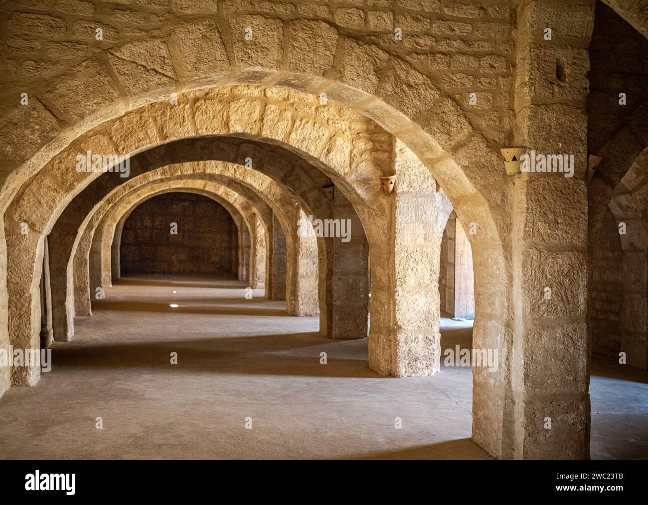 An arched stone passageway inside the 8th century religious fortress ...
