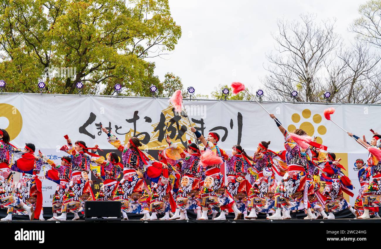 Japanese yosakoi dancers in bright multi-coloured costumes on open-air ...
