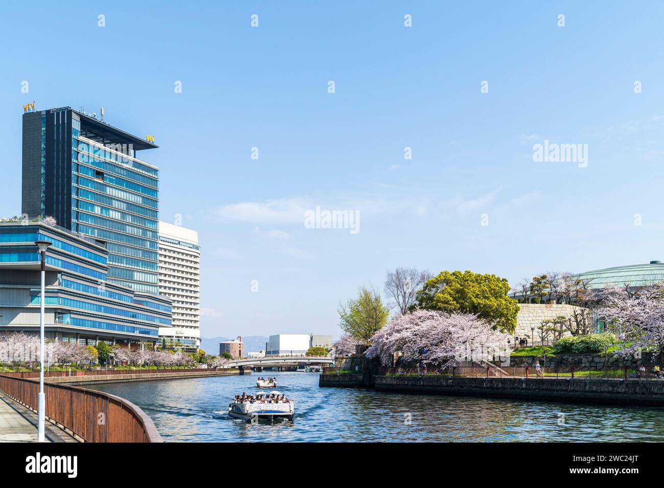 View from Shinshigino Bridge of Osaka Business park on the left, the ...