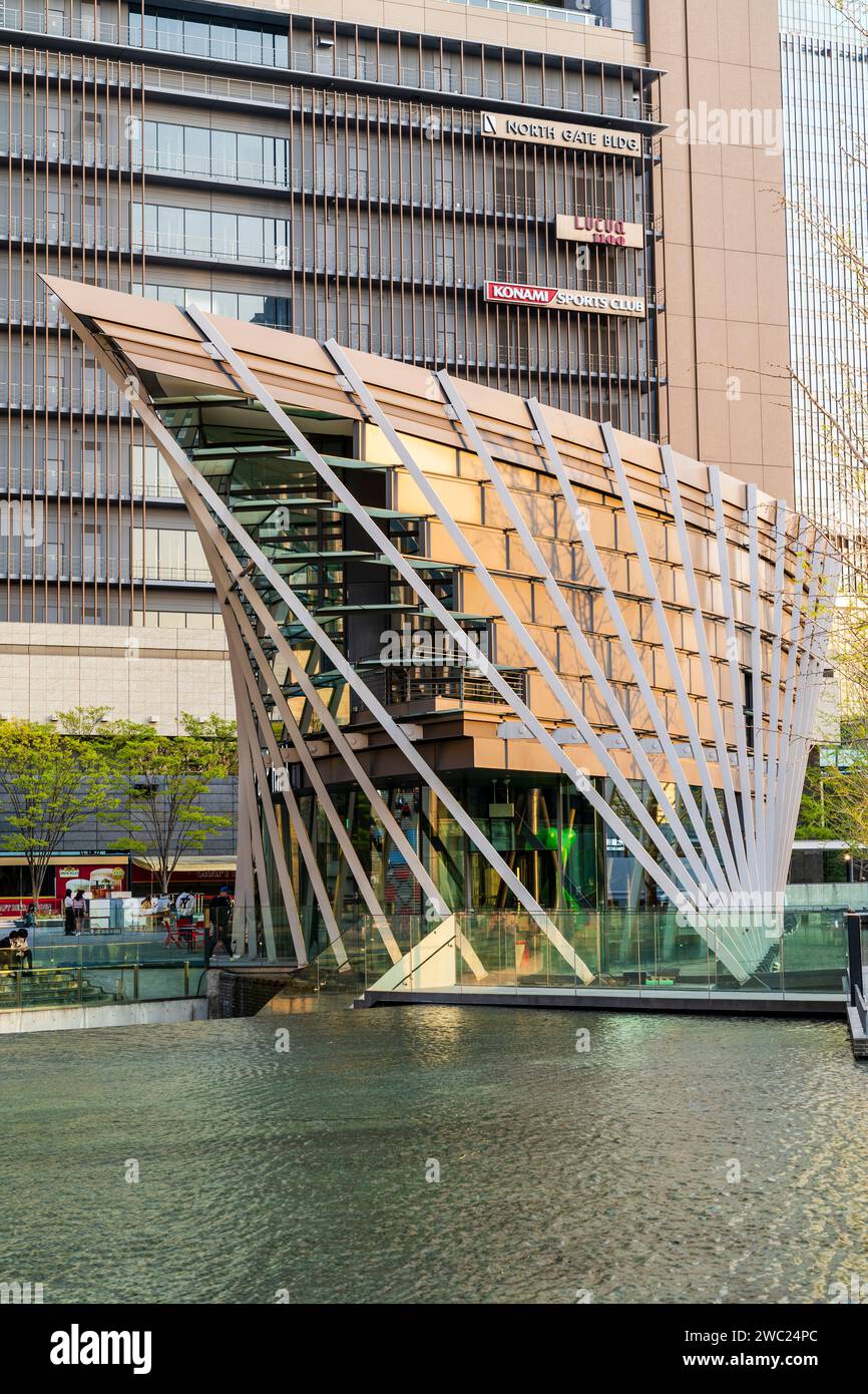 Umekita Ship Hall and water feature with Osaka Station city North gate ...