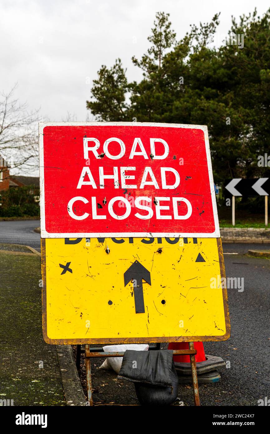 British red 'road ahead closed' sign with another yellow sign ...