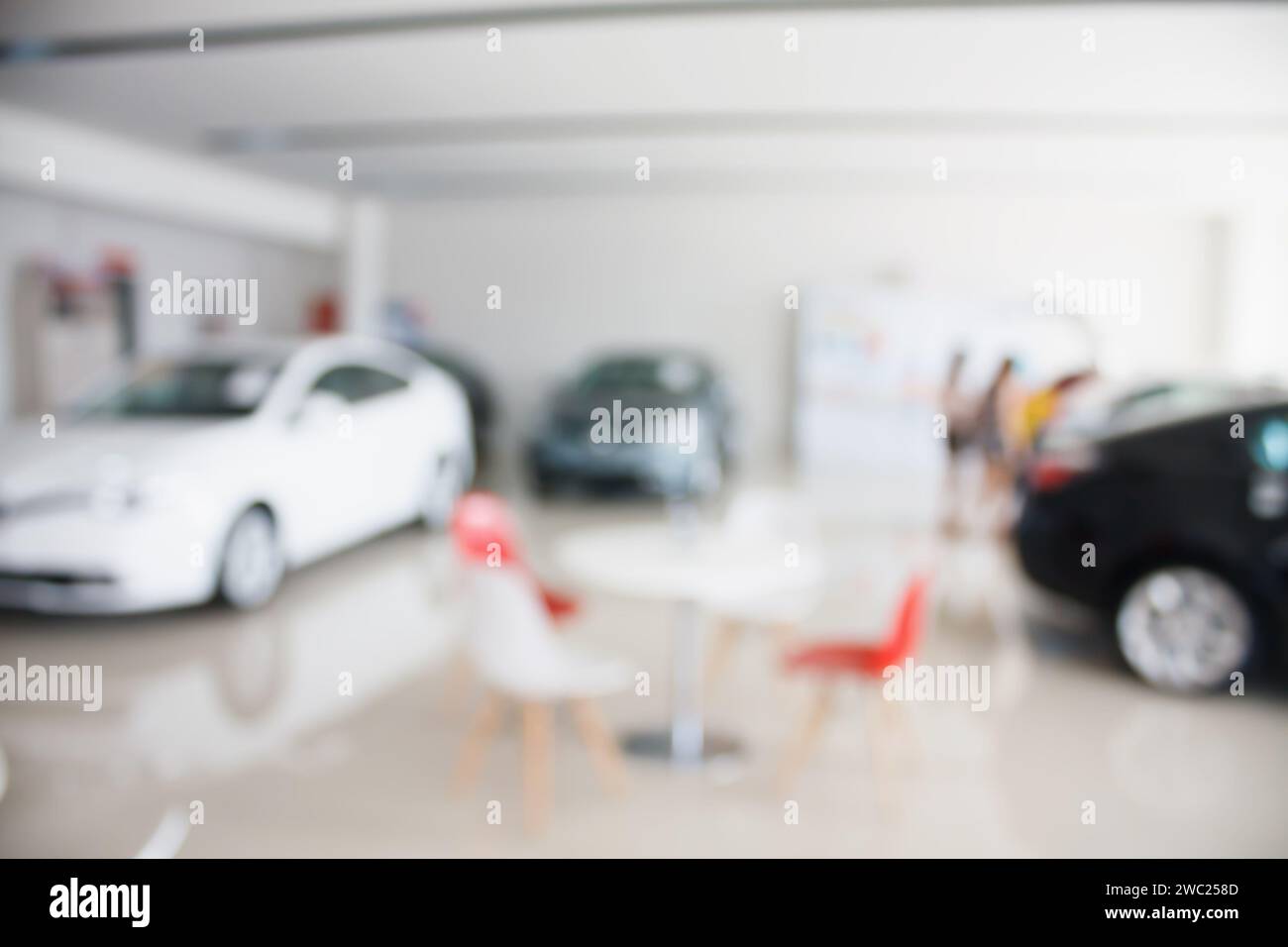 new car at new car showroom dealership blurred background Stock Photo ...