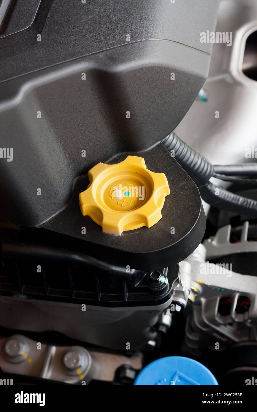 close up engine oil cap in car hood Stock Photo - Alamy