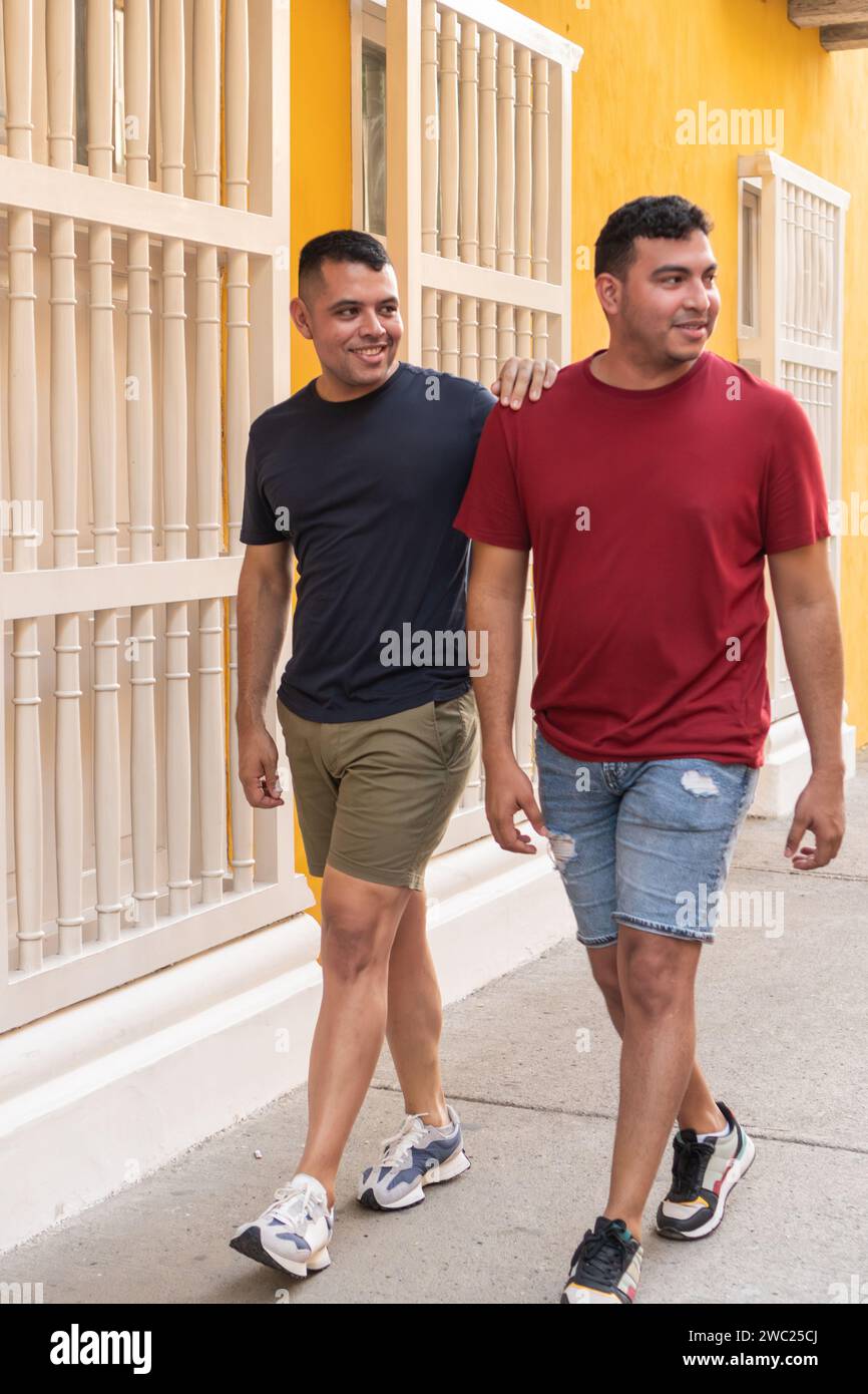 Two friends sharing a relaxed walk along a city street, with a sense of ...