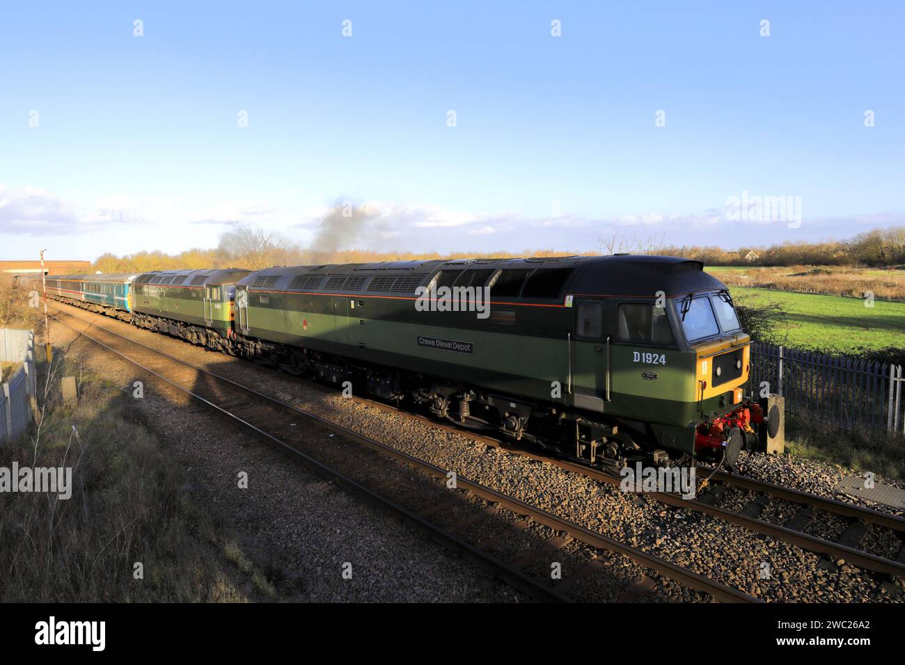 D1924 and D1935 pulling BR Blue carriages at Werrington Junction ...