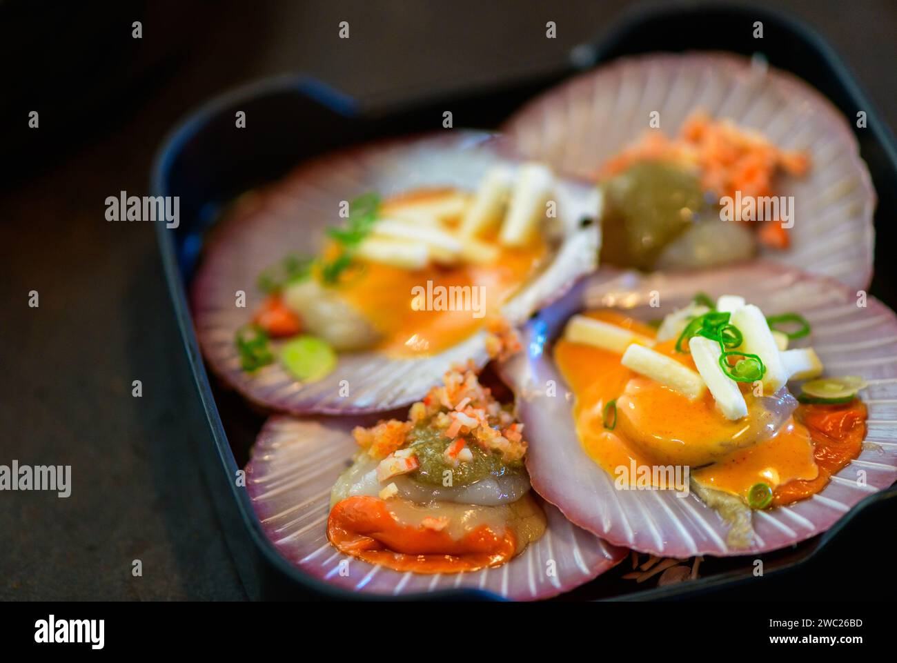 Scallops with Spicy Cheese Sauce.Premium Japanese Buffet concept Stock ...