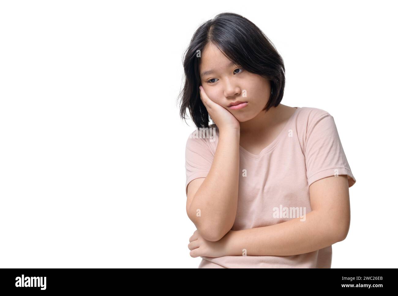 Sad bored asian female student attend boring uninteresting lecture lean ...
