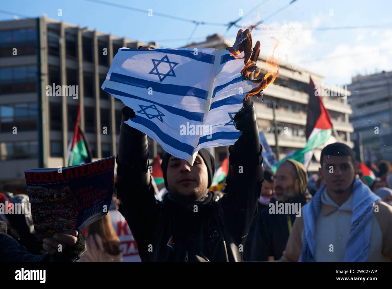 Athens, Greece. 13th Jan, 2024. Palestinians burn an israeli flag in ...