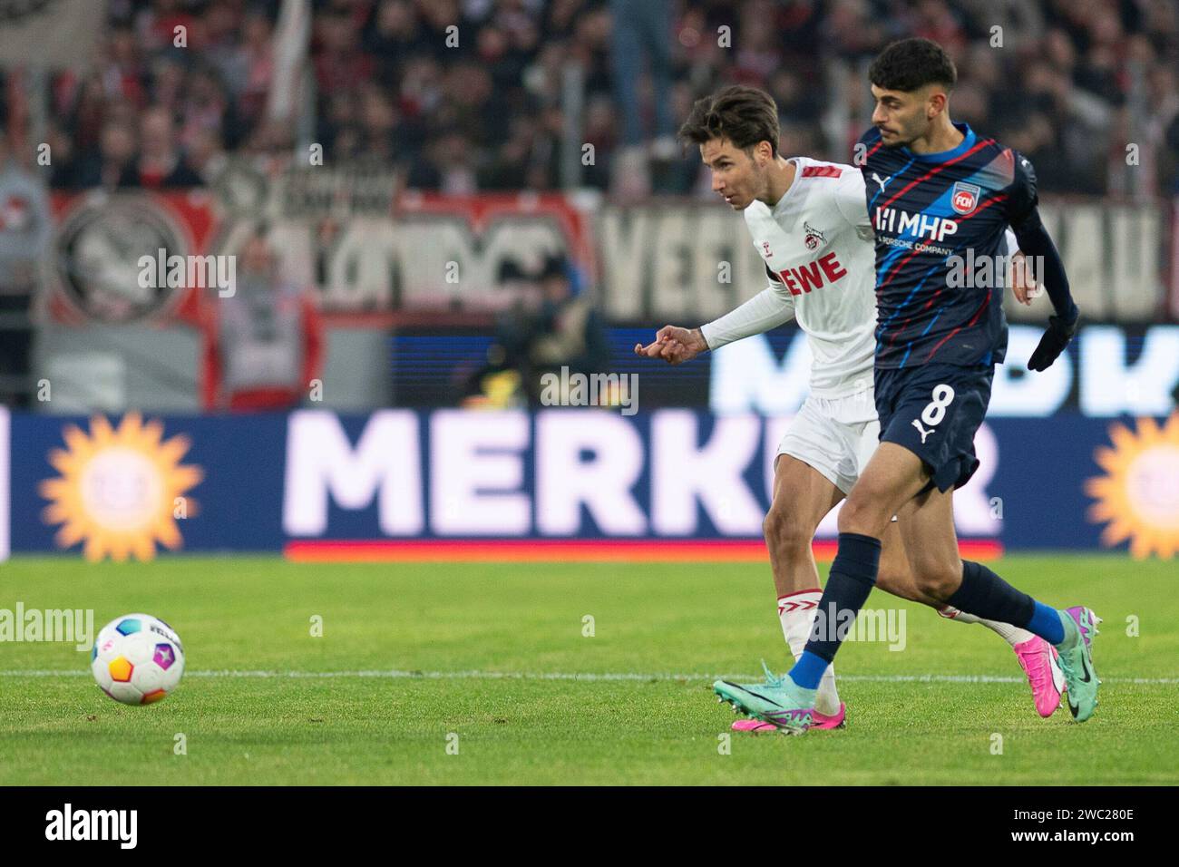 Koeln, Deutschland. 13th Jan, 2024. Zweikampf Denis Huseinbasic (1. FC Koeln, #08) gegen Eren ...