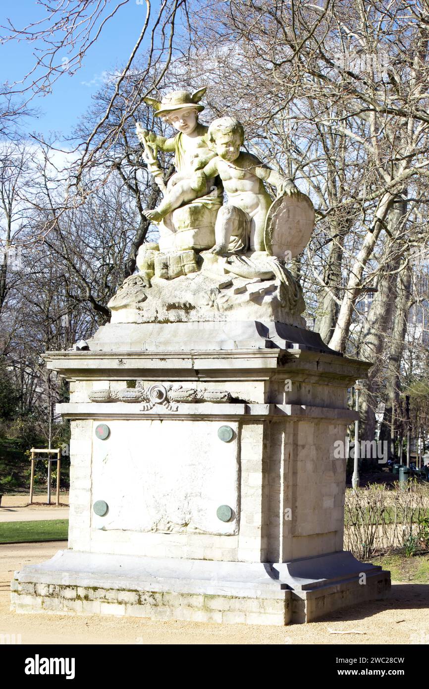 Historic Stone Monument with Sculpture in Park Stock Photo - Alamy