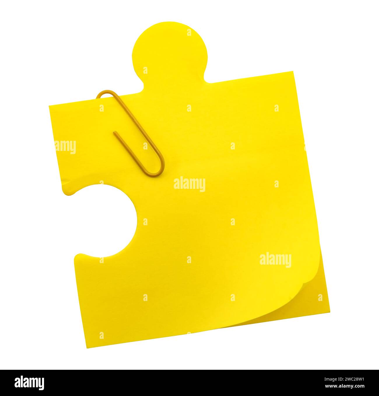 Tear-off sheets of paper for notes in the shape of a puzzle on a white ...