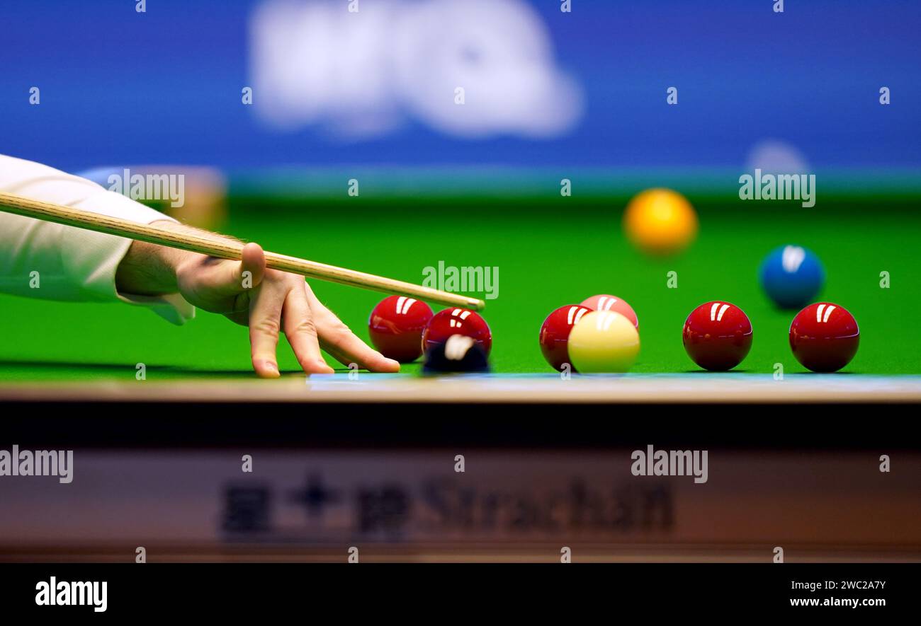 The hand of Shaun Murphy plays a shot during his semi final match ...