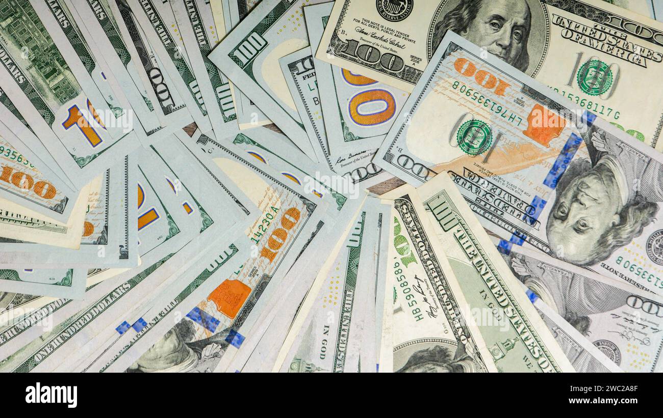 Group of money stack of 100 US dollars banknotes Stock Photo - Alamy