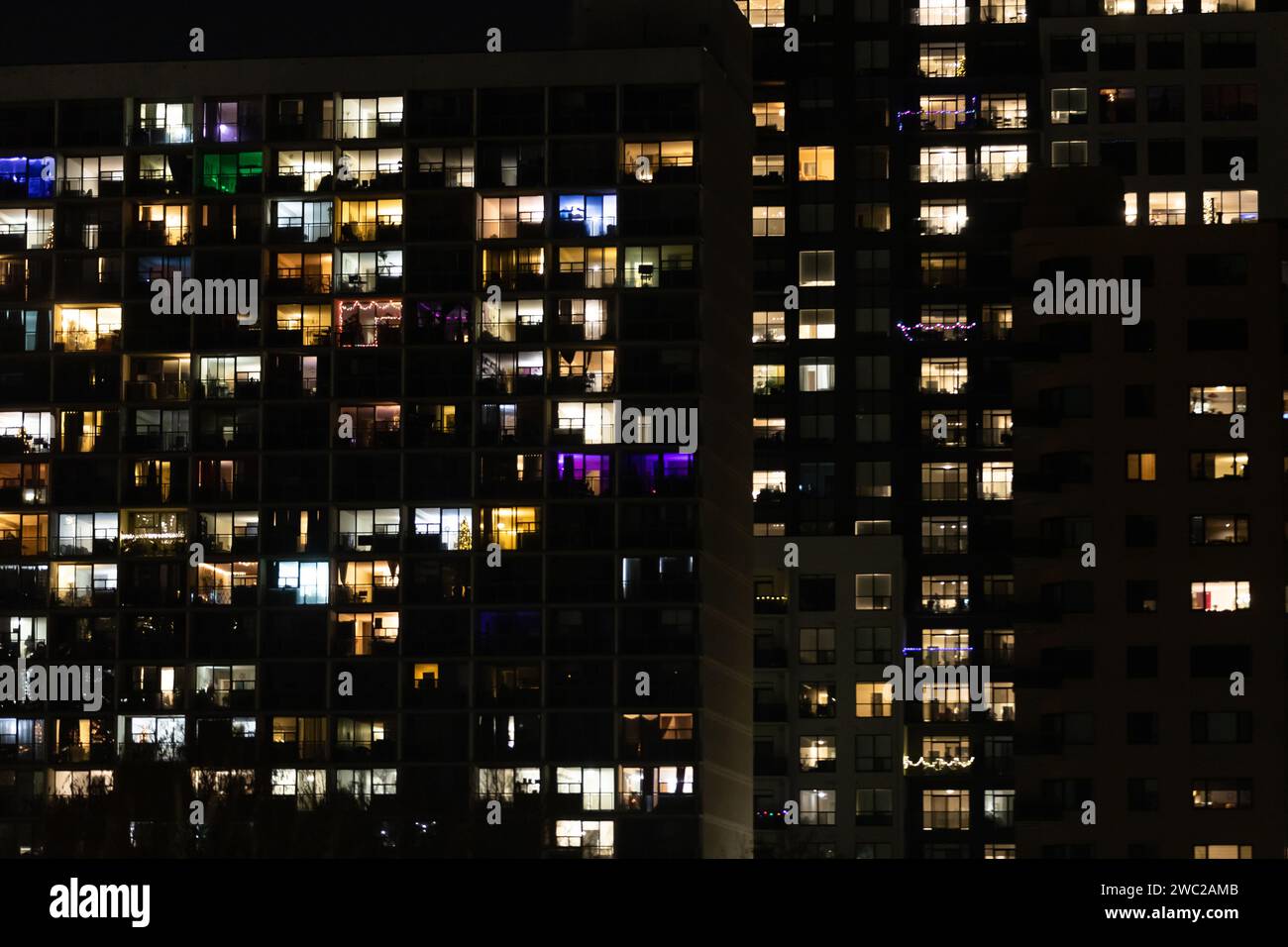 A city at night showing high rise apartment buildings and condo's Stock ...