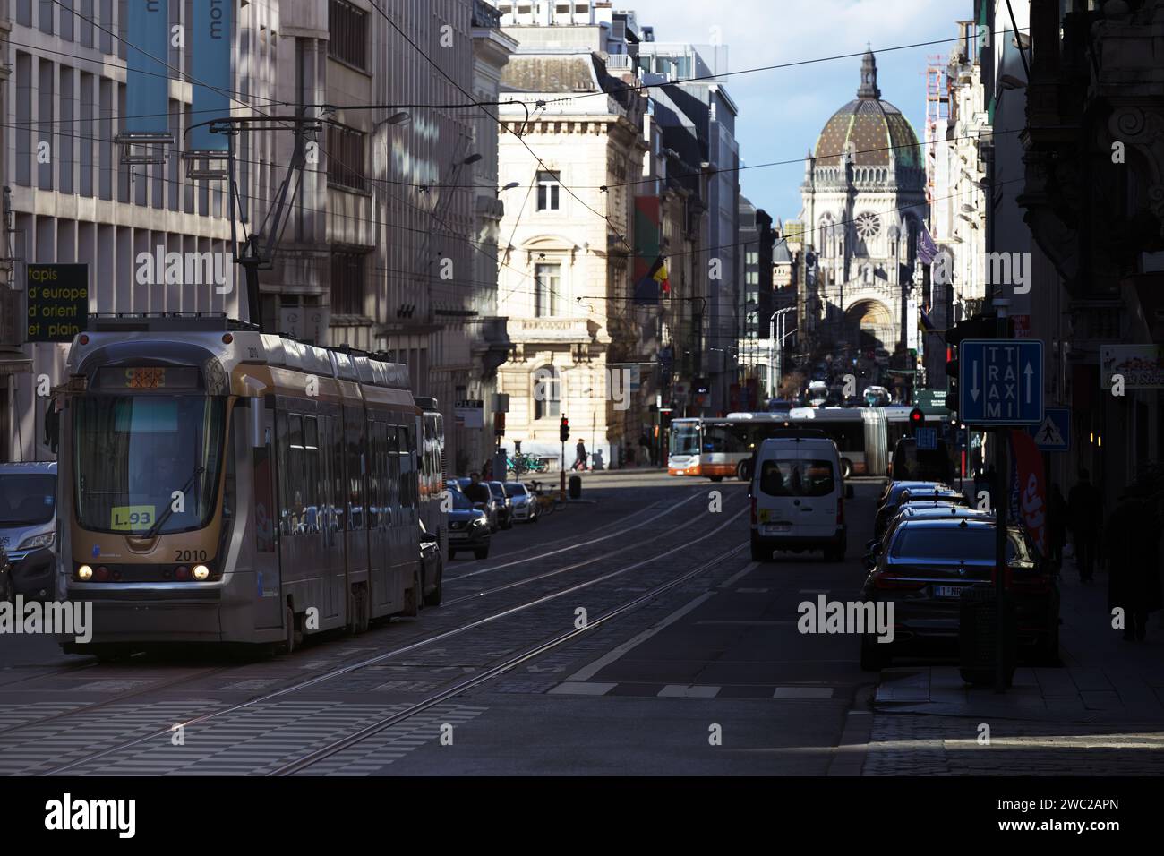 Dynamic Street Scene with Tram in European City Stock Photo - Alamy