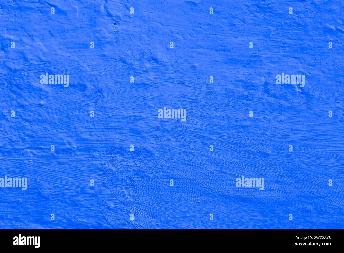Surface of damaged blue plaster. Surface of blue plaster on the wall ...