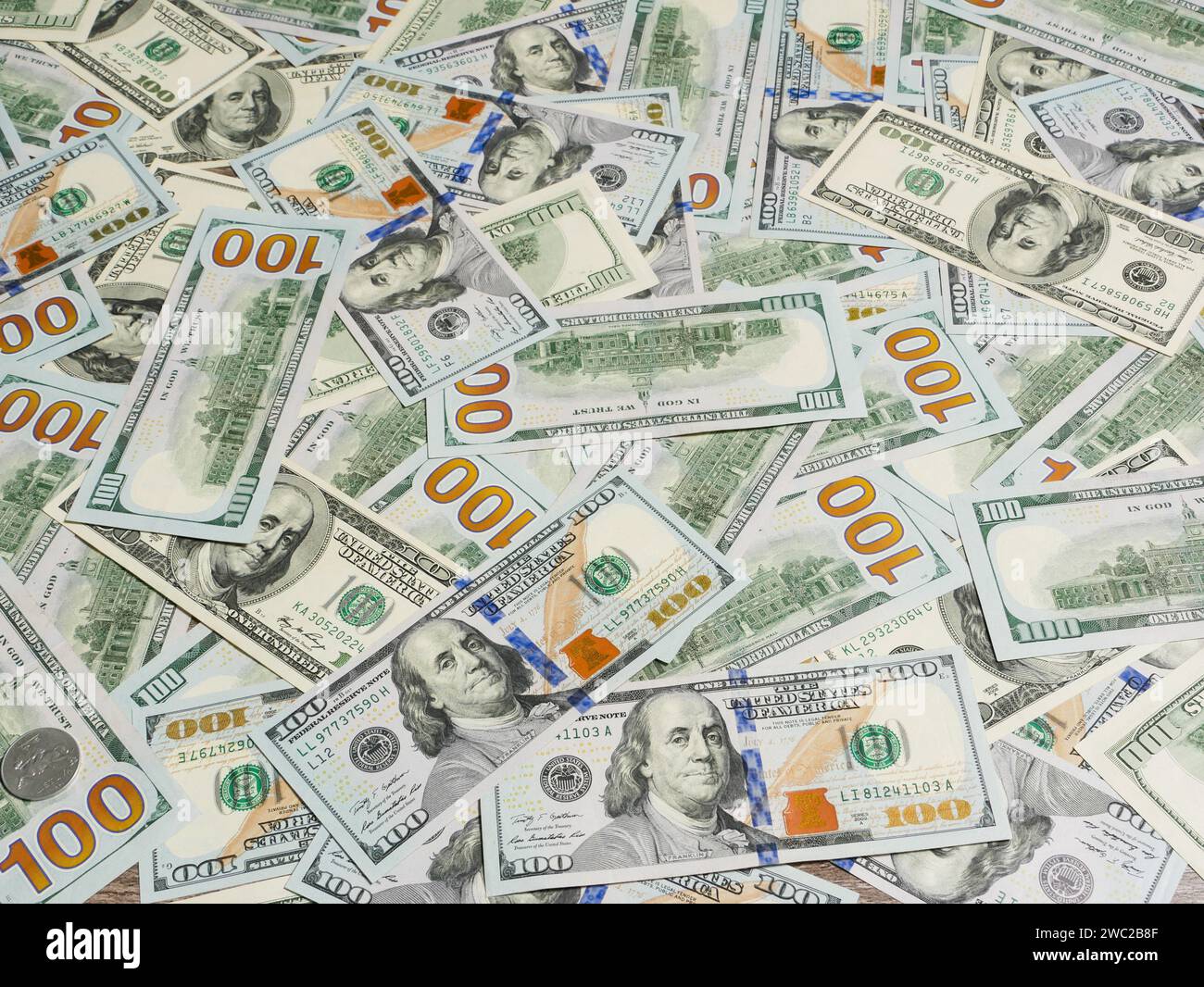 Group of money stack of 100 US dollars banknotes a lot of the ...