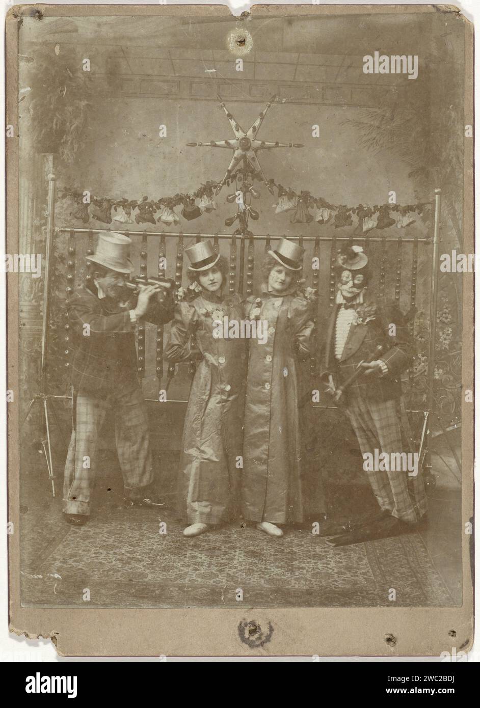 Two clowns and two women in circus costume, anonymous, c. 1890 - c ...