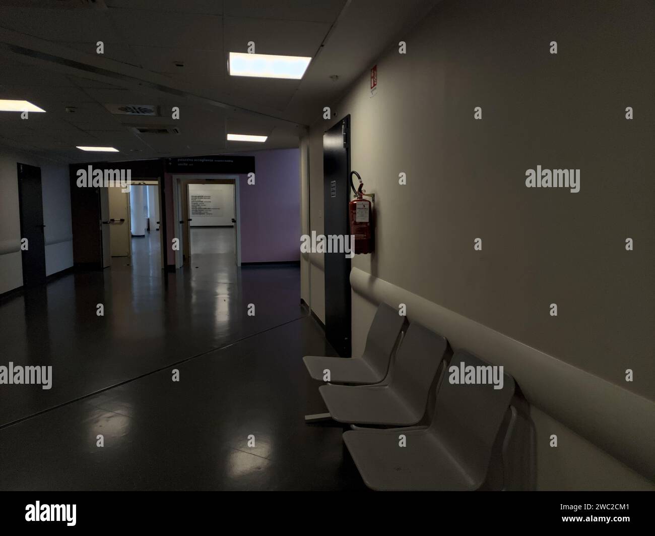 Corridor of a hospital with escape doors in it Stock Photo - Alamy