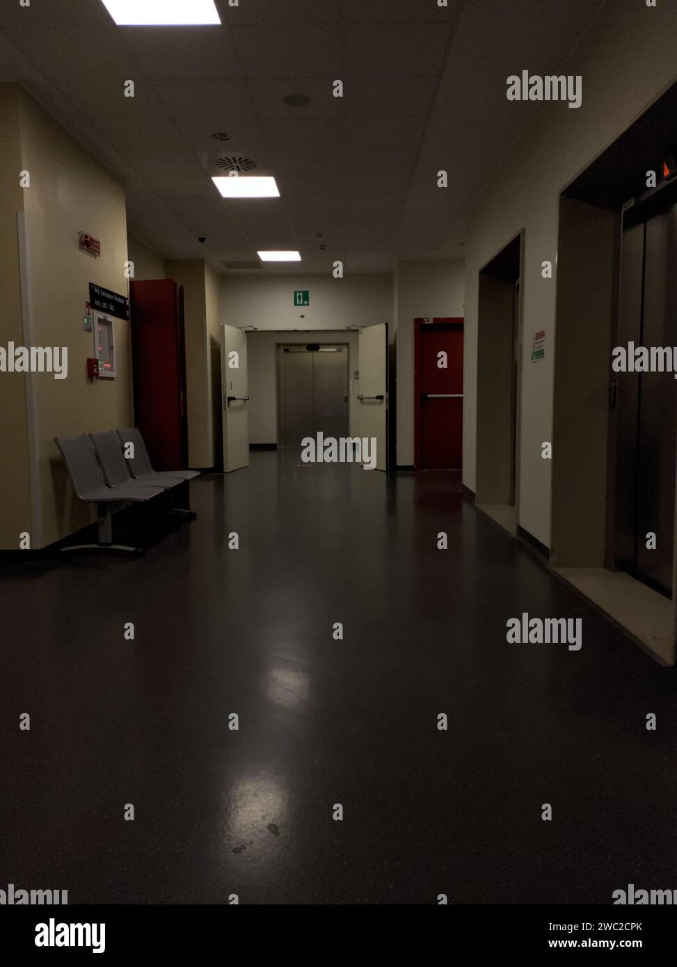 Corridor of a hospital with escape doors in it Stock Photo - Alamy