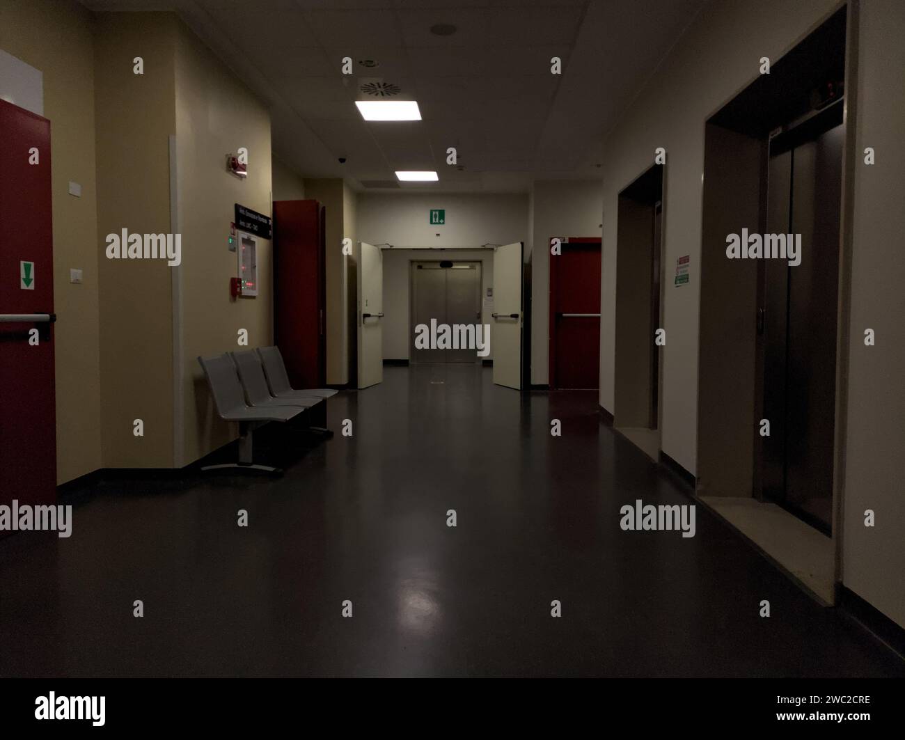 Corridor of a hospital with escape doors in it Stock Photo - Alamy