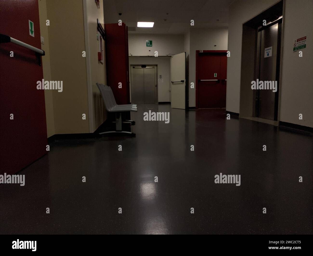 Corridor of a hospital with escape doors in it Stock Photo - Alamy