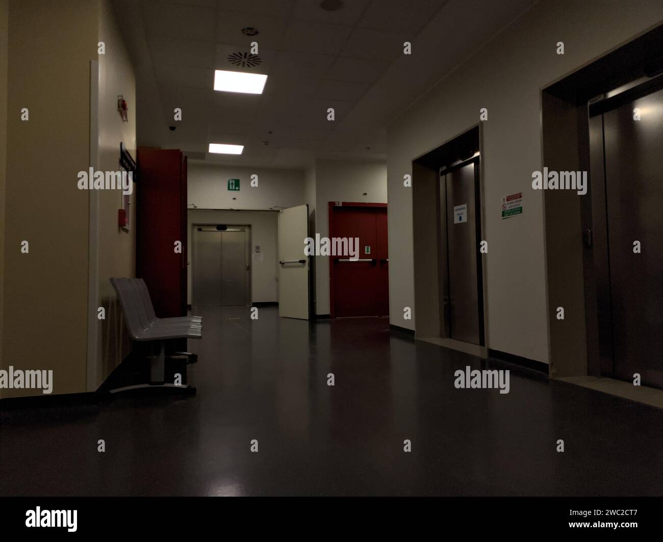 Corridor of a hospital with escape doors in it Stock Photo - Alamy
